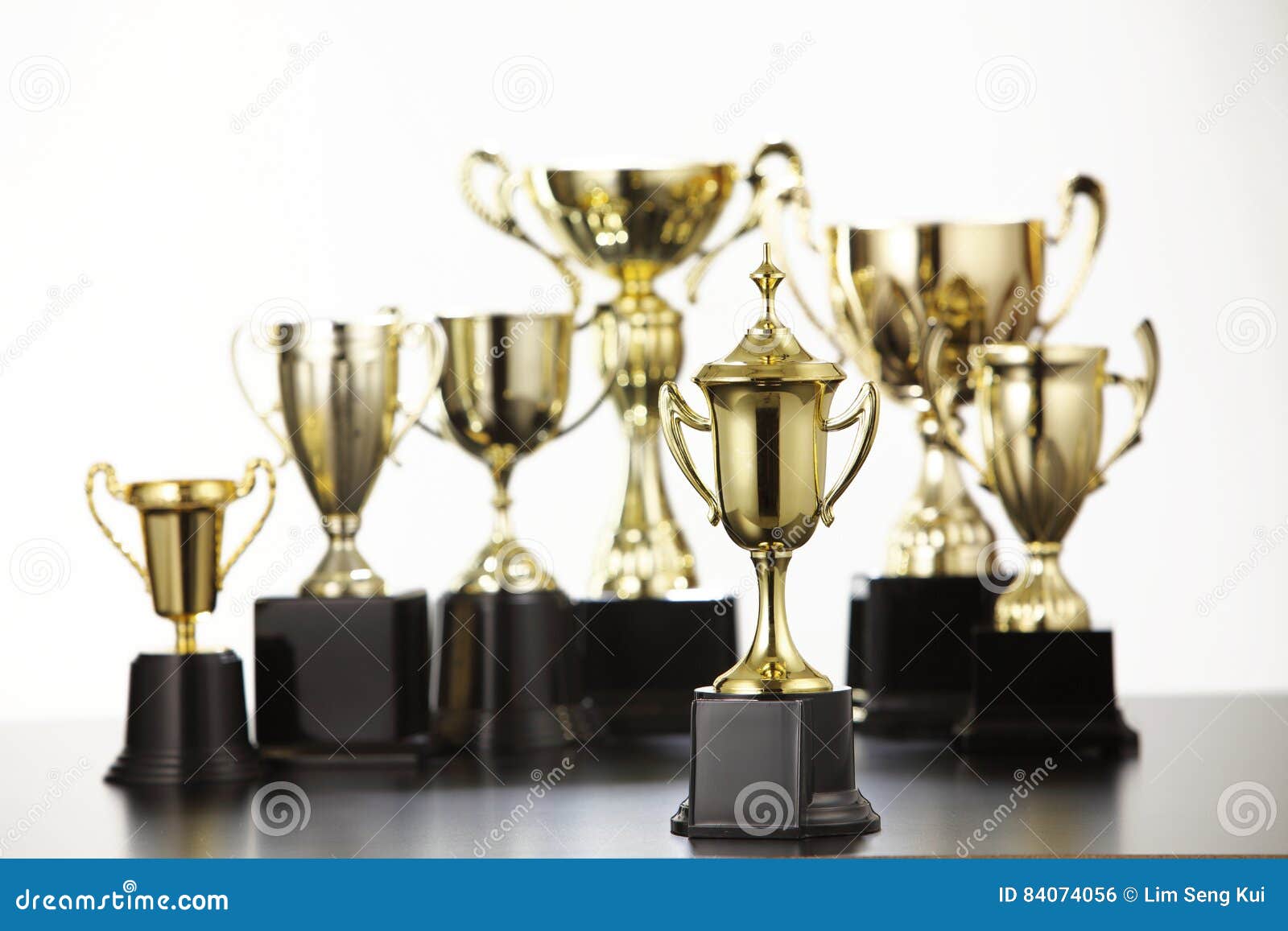 Golden trophy stock photo. Image of champion, medal, group - 84074056