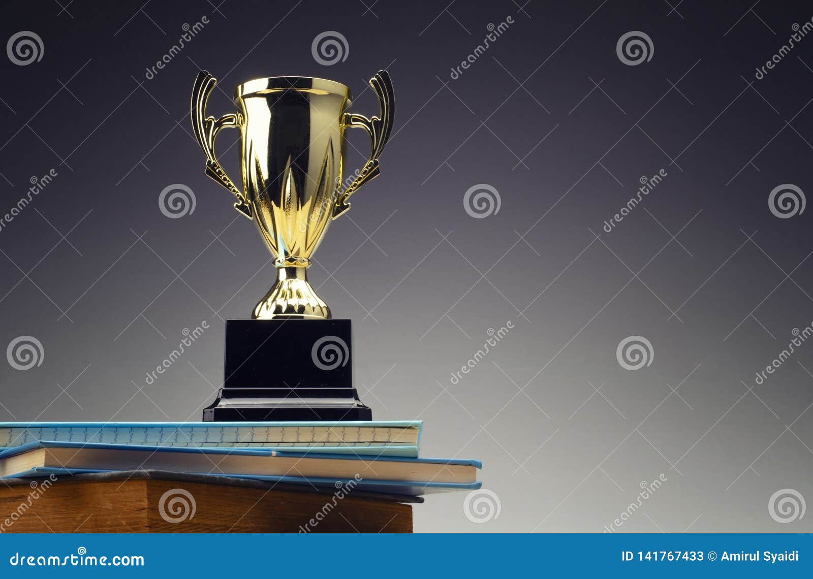 Golden Trophy on Stack of Book for Education Success Concept Stock ...