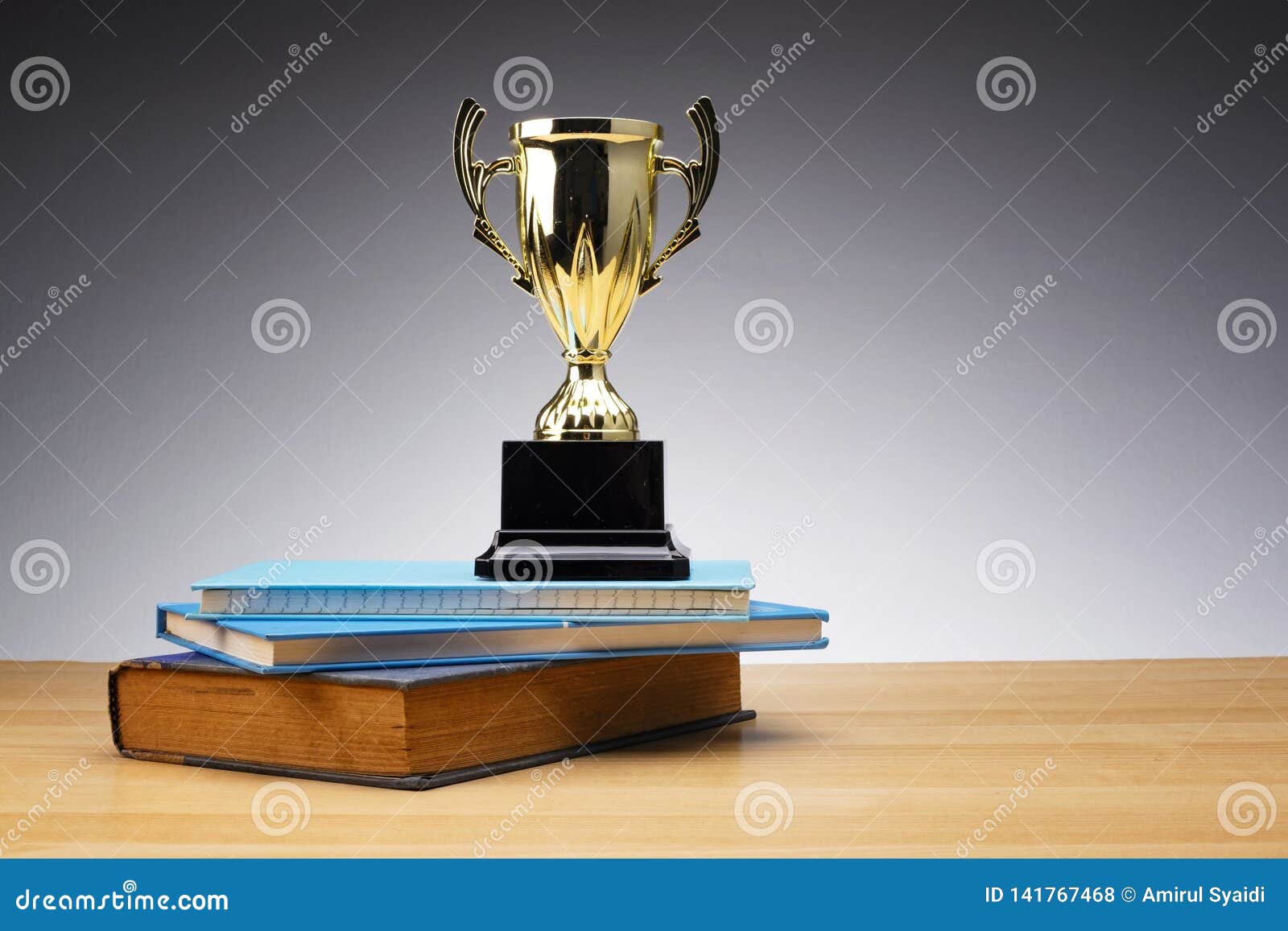 Golden Trophy on Stack of Book for Education Success Concept Stock ...