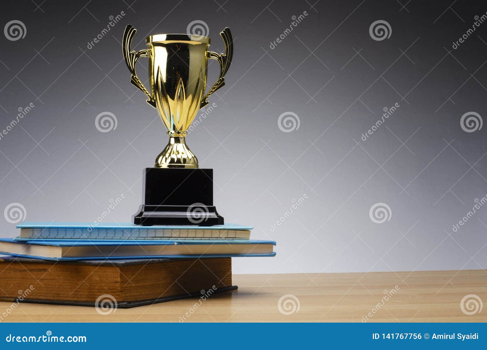 Golden Trophy on Stack of Book for Education Success Concept Stock ...