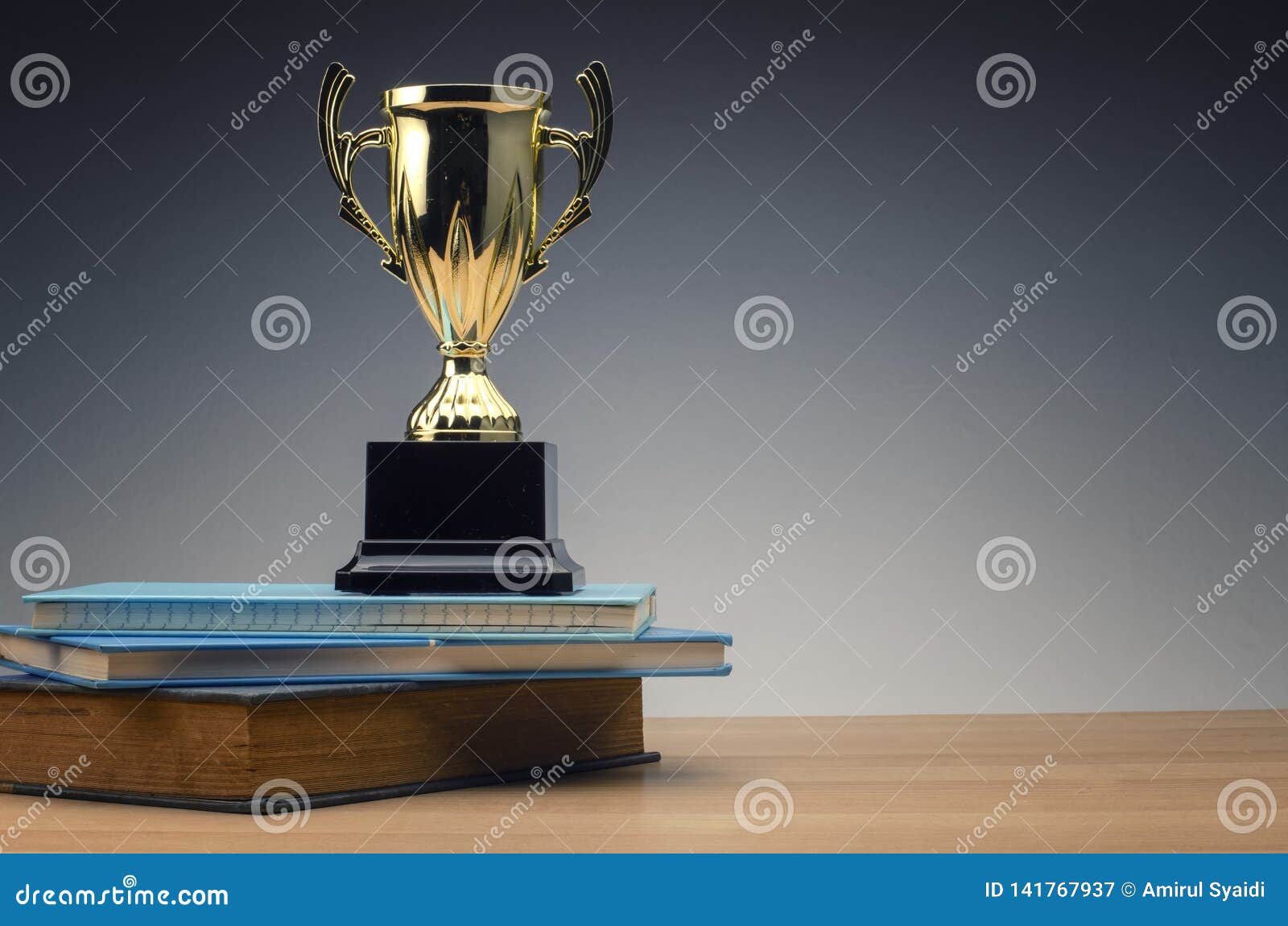 Golden Trophy on Stack of Book for Education Success Concept Stock ...