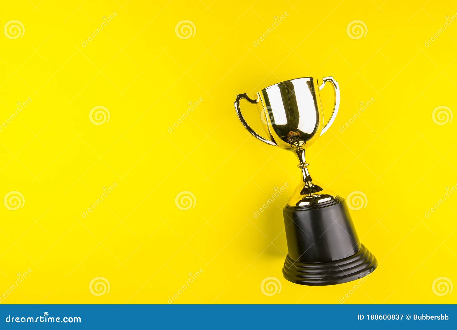 Golden Trophy on Yellow Background.Concept Championship Stock Image ...