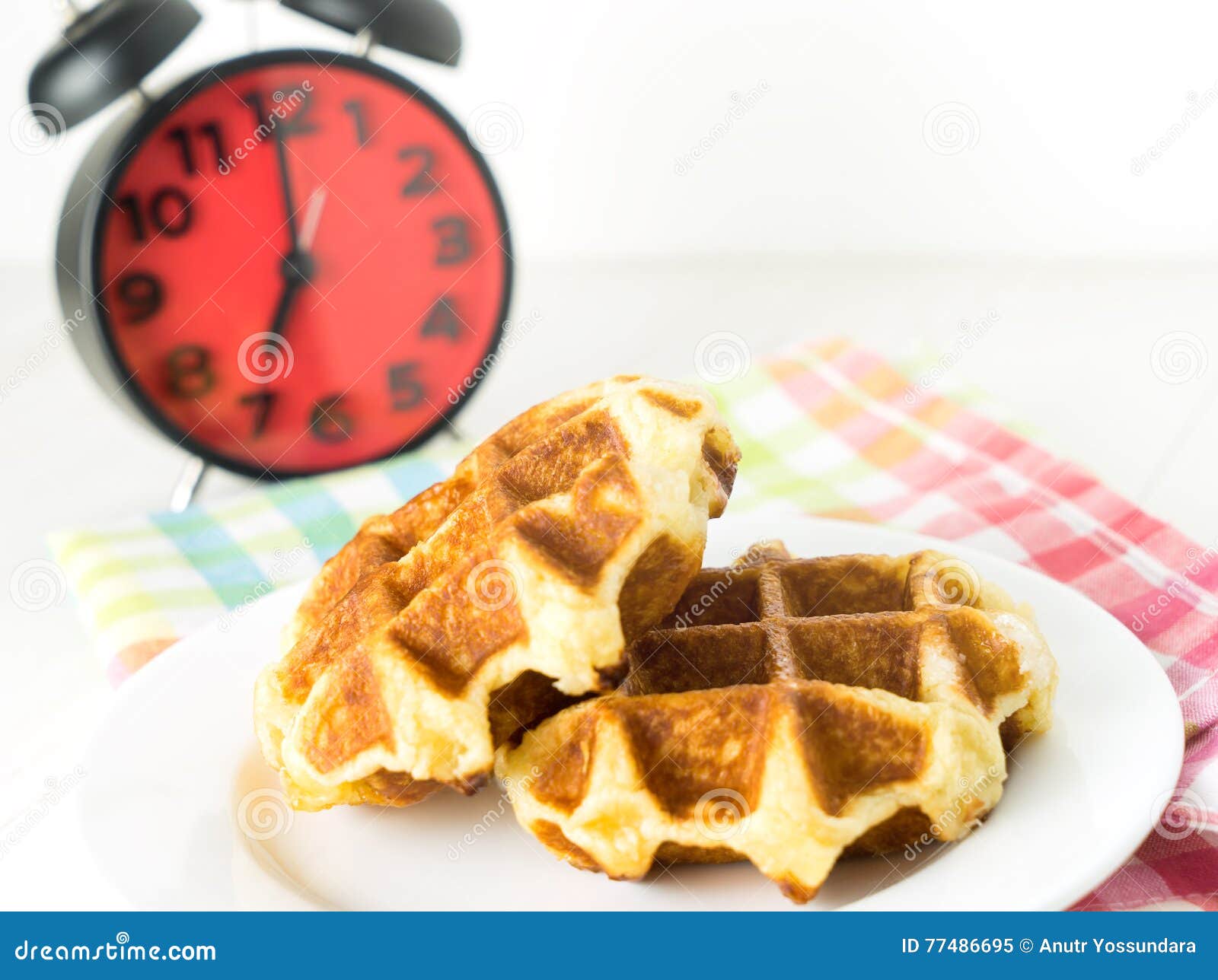 Golden Waffle for Breakfast with Alarm Clock Stock Image - Image of ...