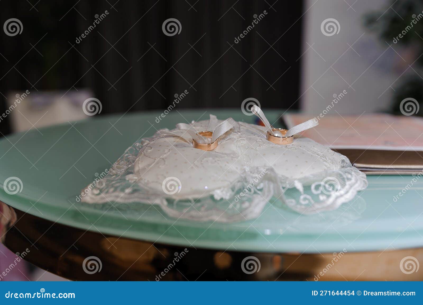 Golden Wedding Rings on a Stand on the Table. Wedding Ceremony Stock ...