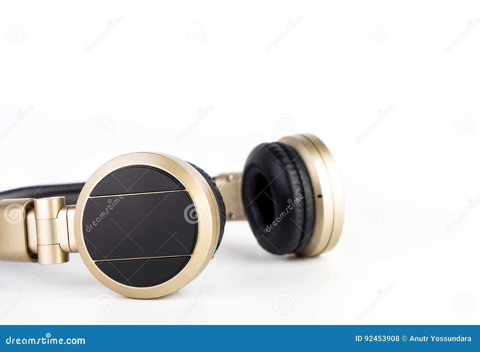 Golden Wireless Headphone Isolated on White Stock Photo - Image of ...