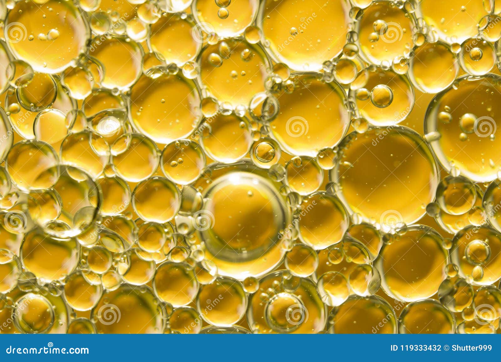 Golden yellow bubble oil stock photo. Image of laboratory - 119333432