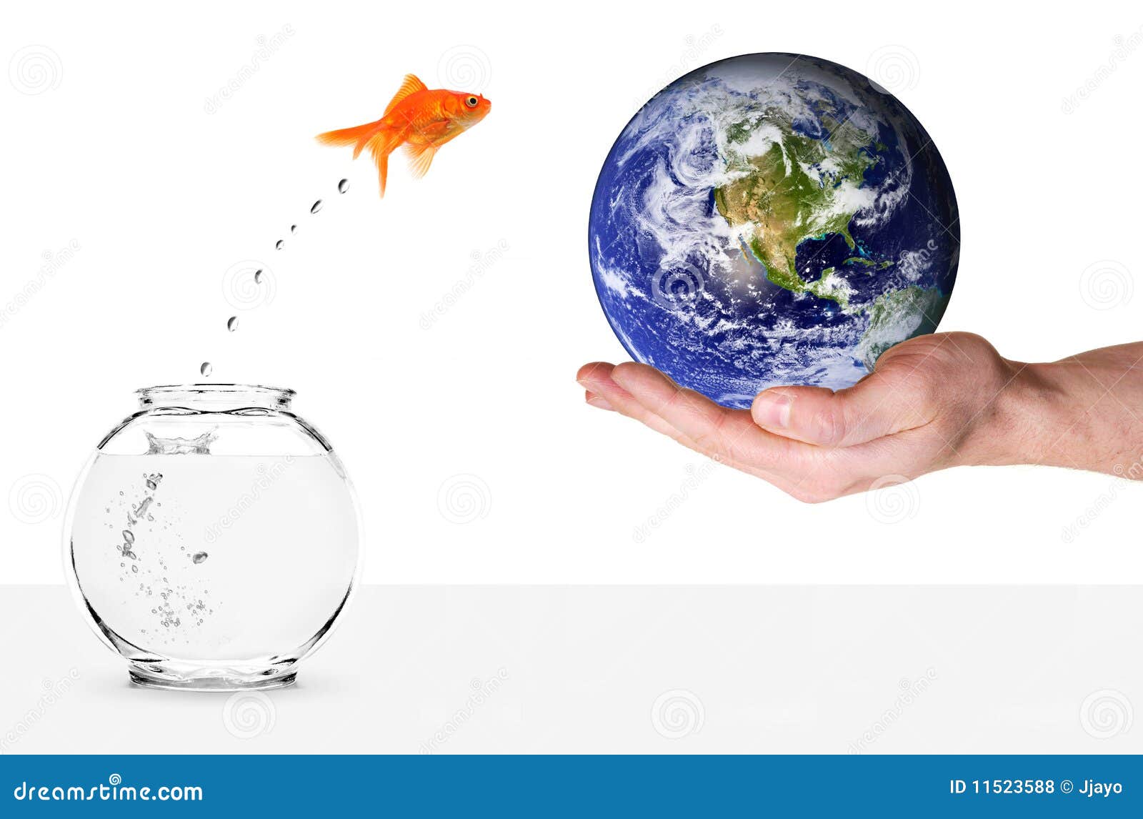 Goldfish Jumping into Planet Earth Stock Photo - Image of ignorance ...