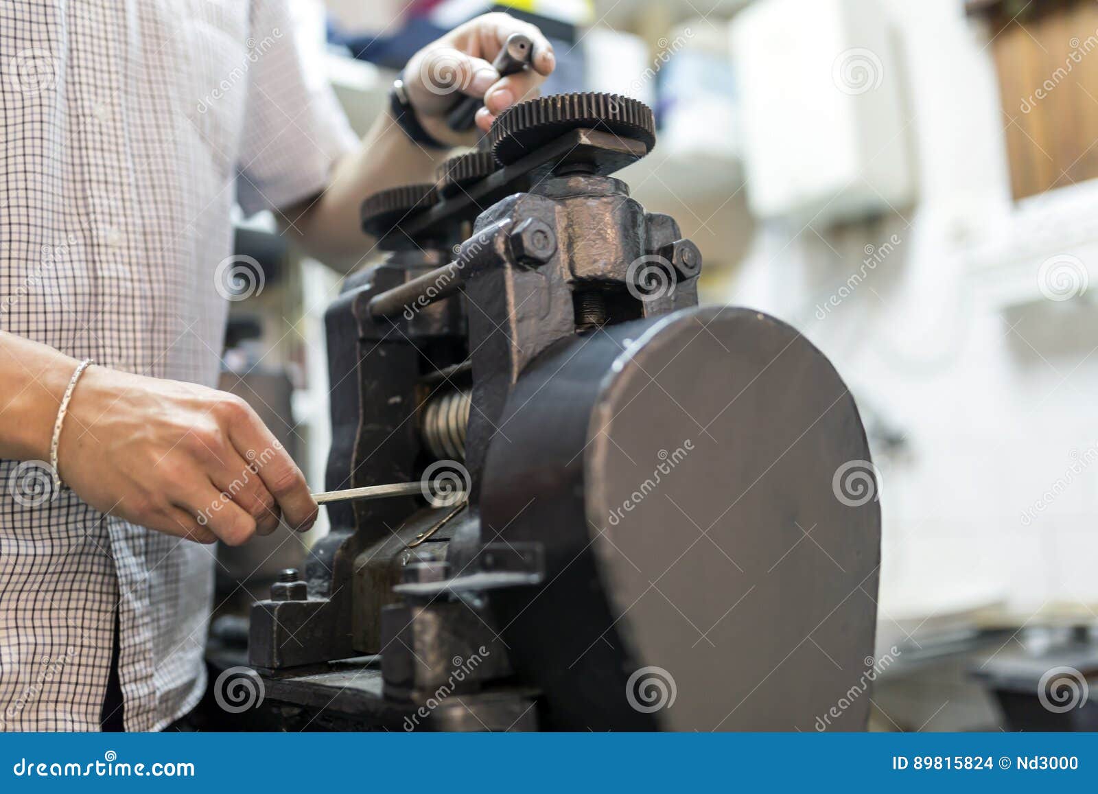 Goldsmith using machine stock photo. Image of workshop - 89815824