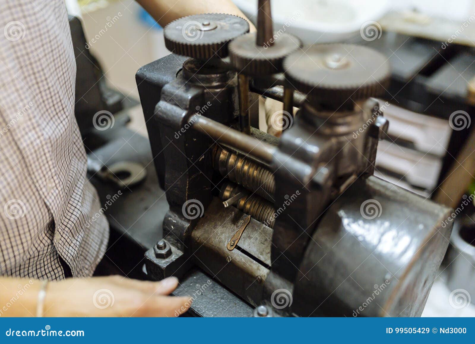 Goldsmith using machine stock image. Image of grind, working - 99505429