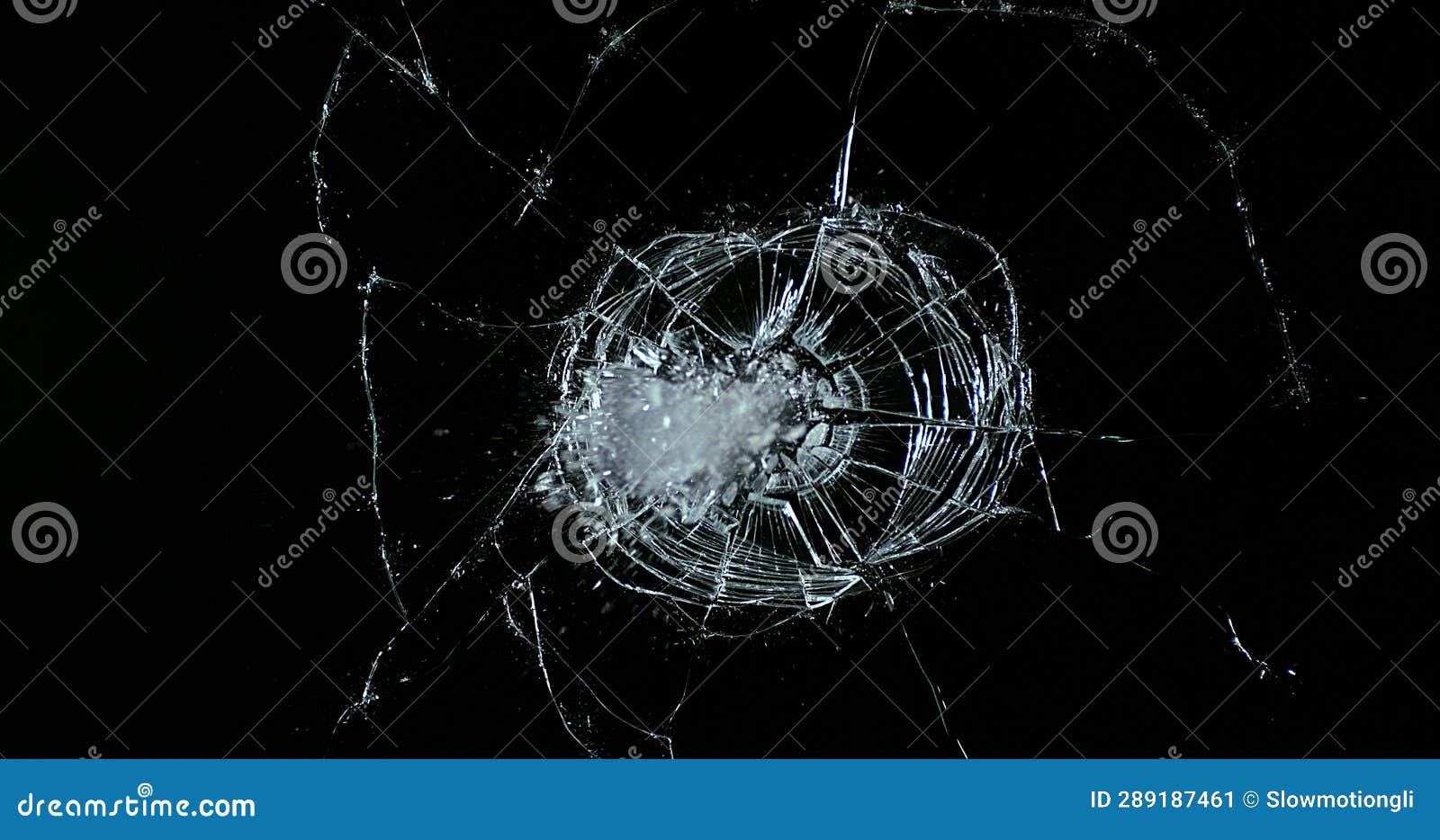 Golf Ball Breaking Pane of Glass Against Black Background Stock Image ...