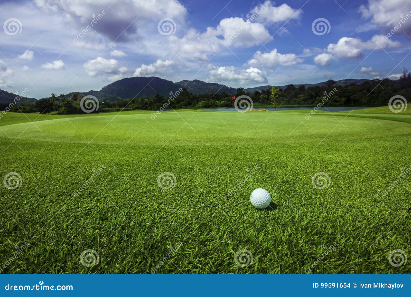 Golf ball on course stock photo. Image of activity, clouds - 99591654