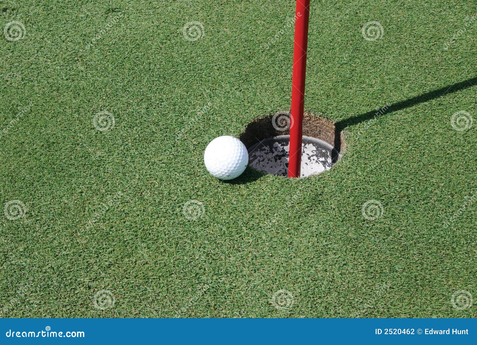 Golf Ball by the hole stock photo. Image of putt, green - 2520462