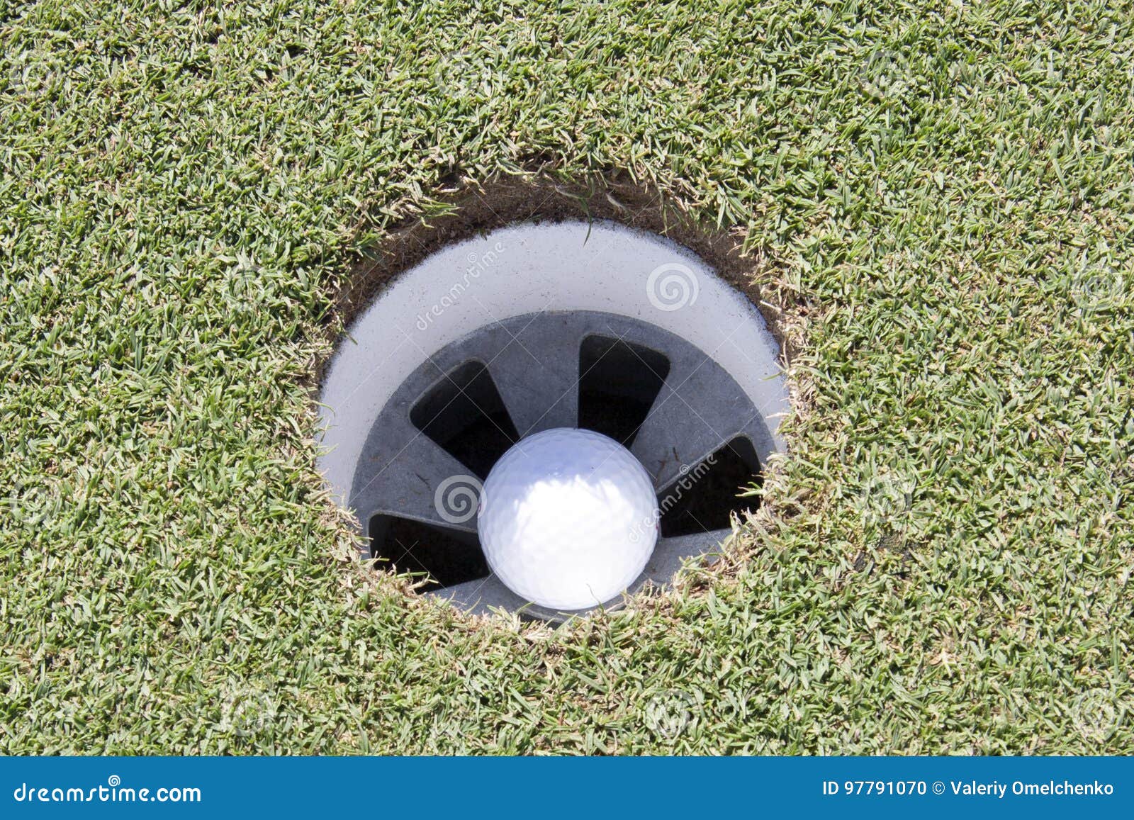 Golf ball in the hole stock photo. Image of green, glade - 97791070