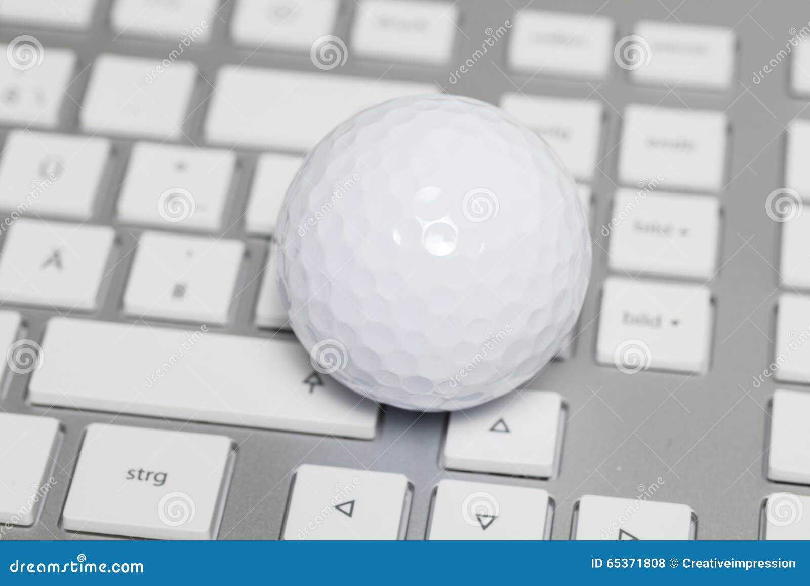 Golf ball on keyboard stock photo. Image of symbol, play - 65371808