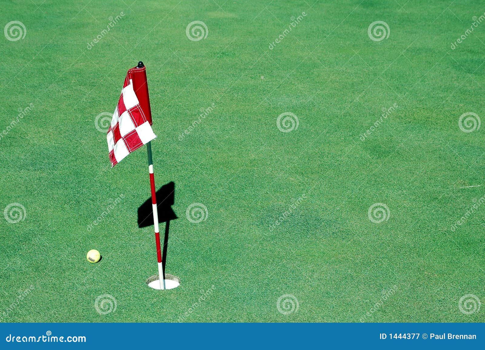 Golf Ball Near Hole and Flag Stock Image - Image of outdoors, putting ...