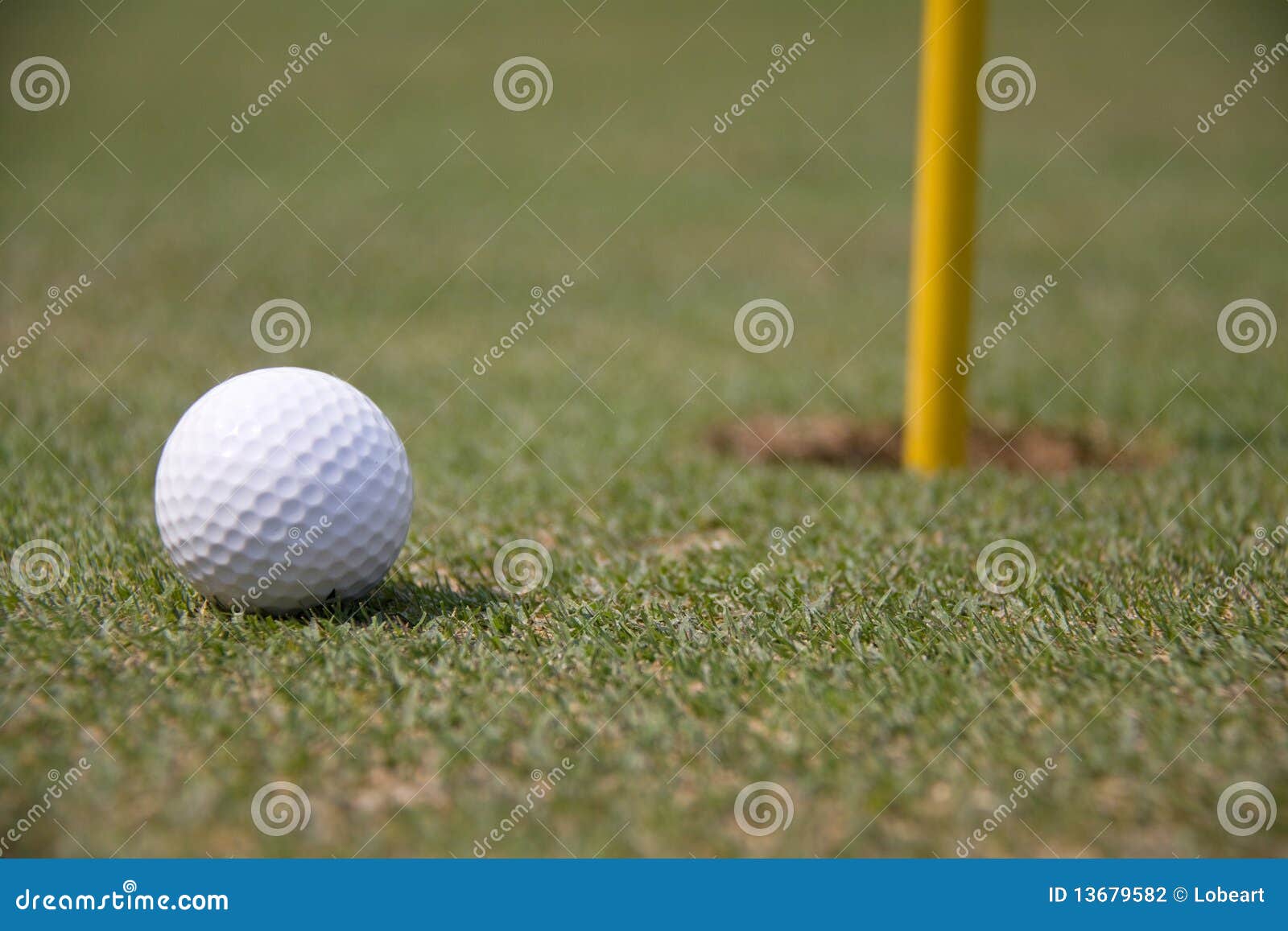 Golf Ball and Pin stock photo. Image of green, flagstick - 13679582