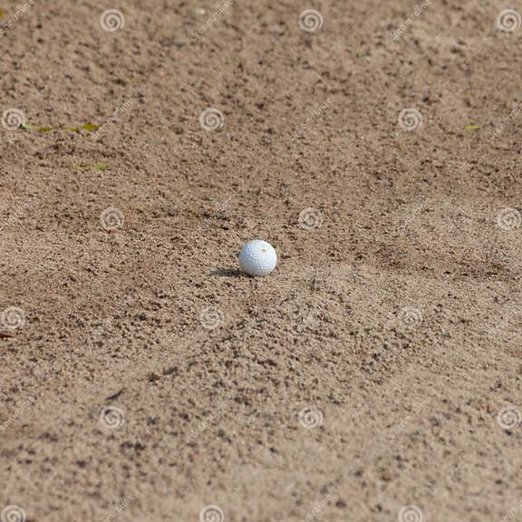 A golf ball in a sand trap stock image. Image of ball - 33482465