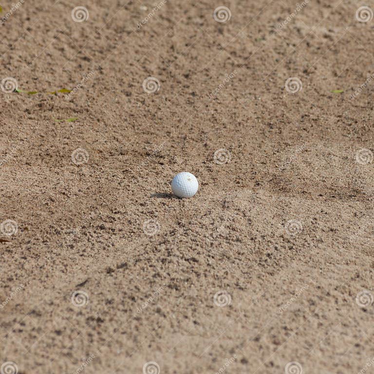 A golf ball in a sand trap stock image. Image of ball - 33482465