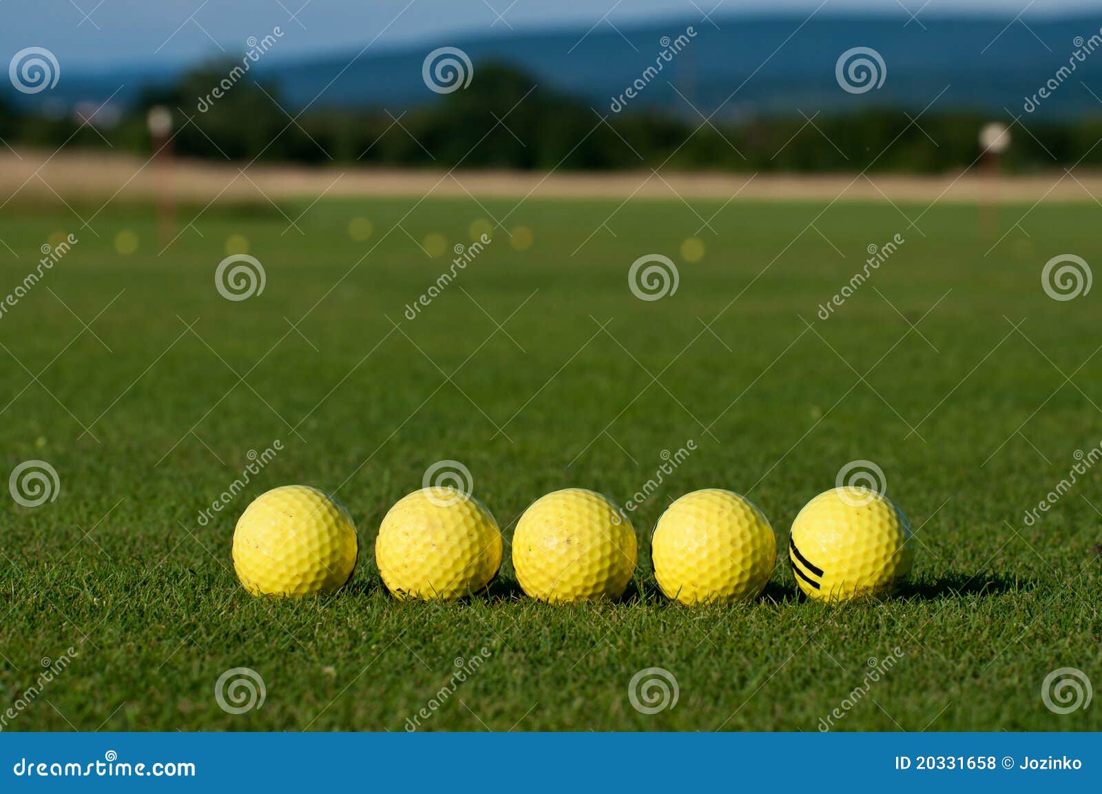 Golf balls stock photo. Image of yellow, golf, shot, green - 20331658