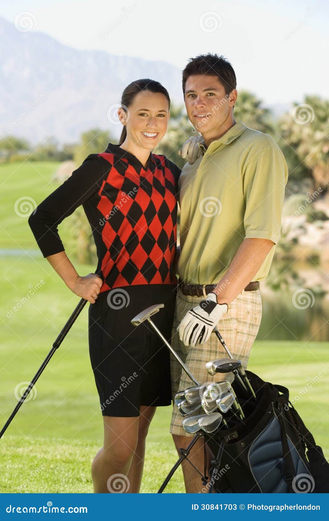 Golf Couple Standing Together on Course Stock Image - Image of leisure ...