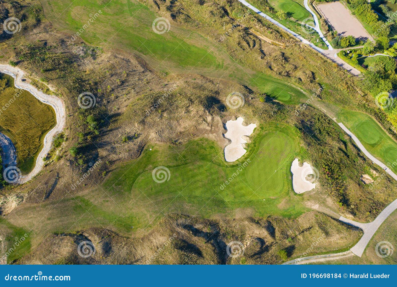 A golf course from above stock photo. Image of drone - 196698184