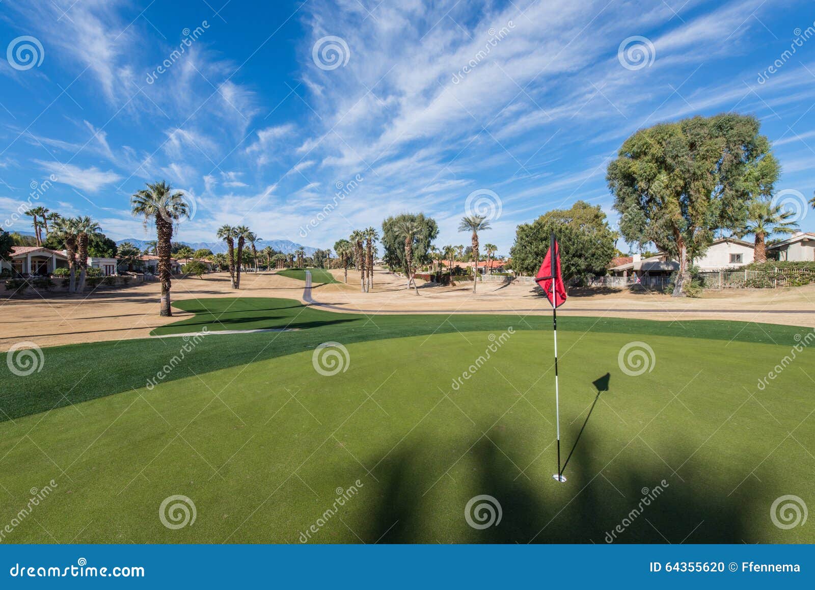 Golf Course Green with Flag in Hole Stock Photo - Image of golf, flag ...