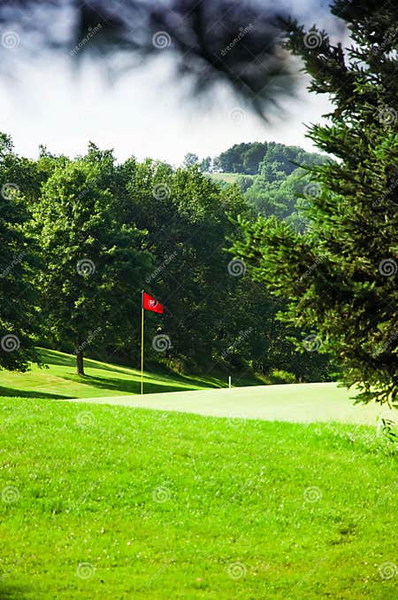 Golf Course with Red Flag in the Middle Stock Image - Image of empty ...