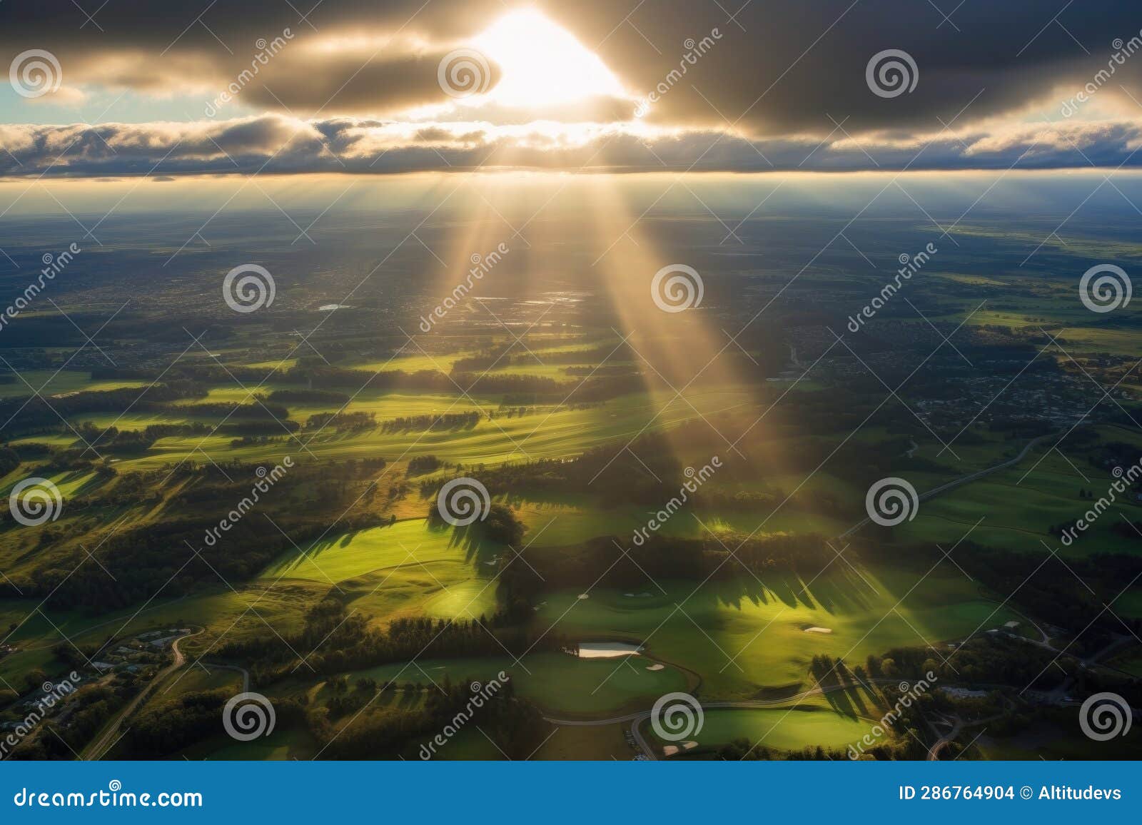 Golf Course from the Sky with Sunrays Shining through Clouds Stock ...