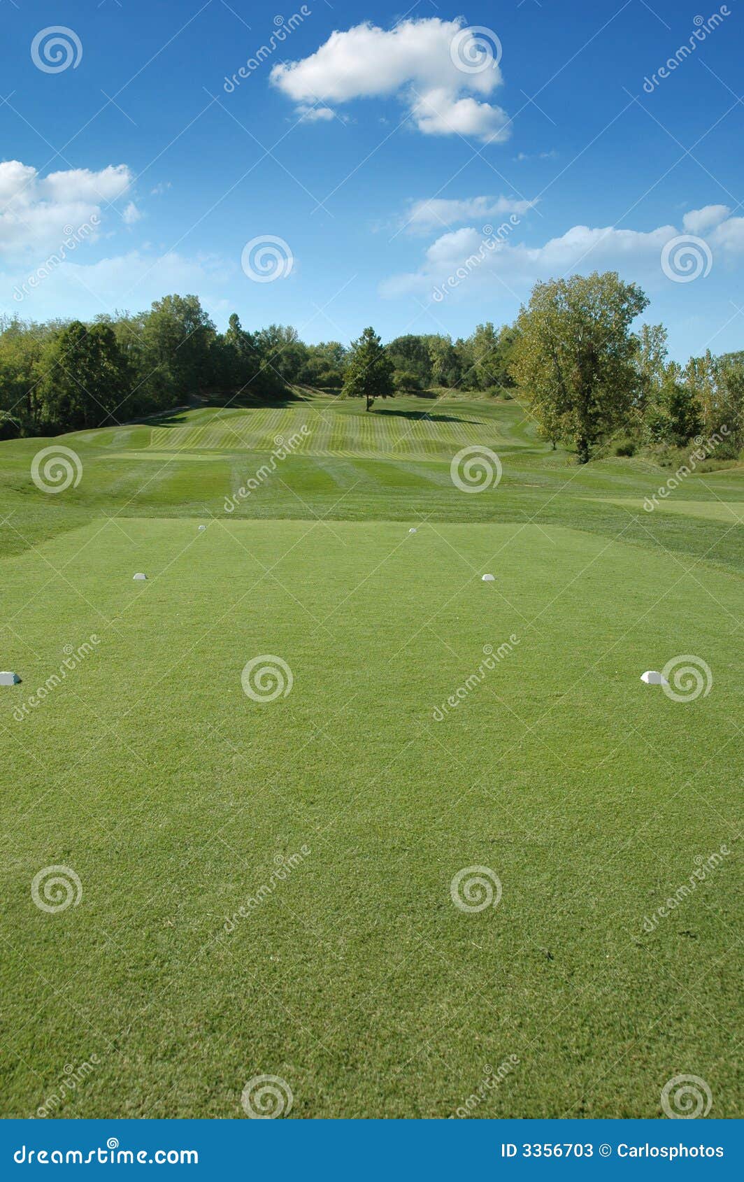Golf course on a sunny day stock image. Image of flag - 3356703