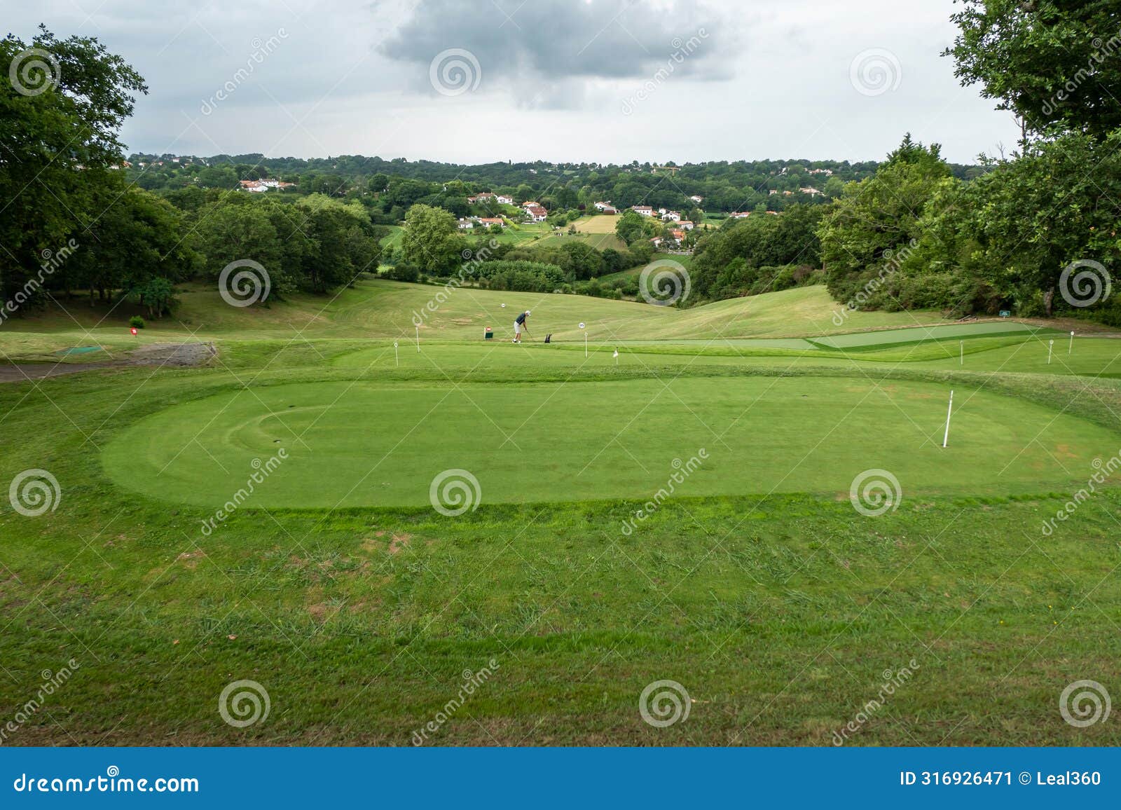 Tranquility on the Golf Course: a Golfer Practices His Swing on a ...