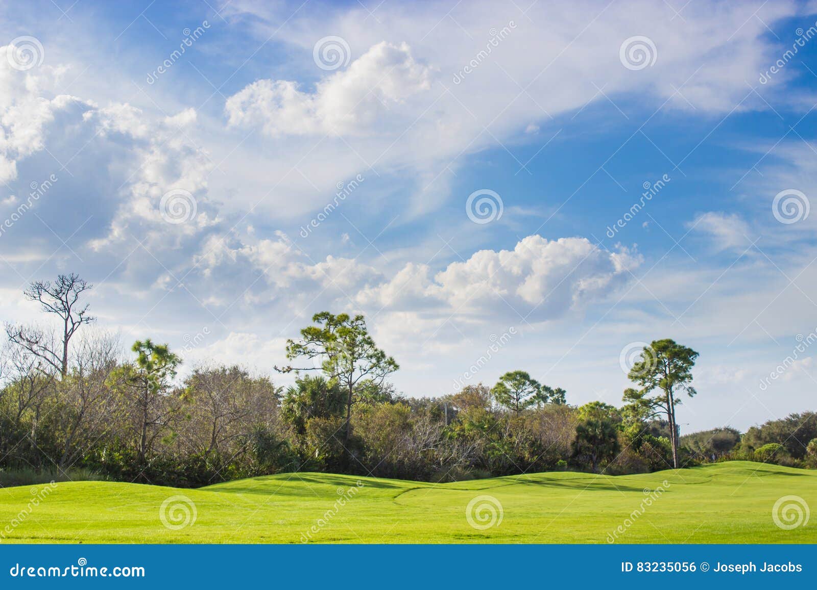 Golf Course Under Beautiful Sky Stock Photo - Image of trees, clouds ...
