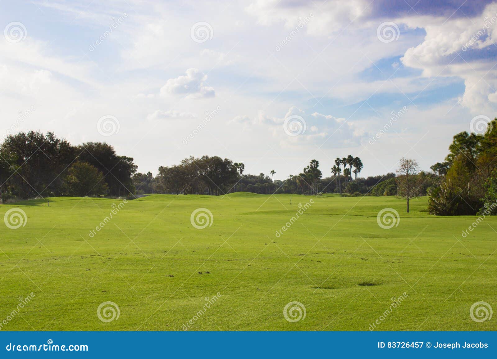 Golf Course Under Beautiful Sky Stock Image - Image of trees, blue ...