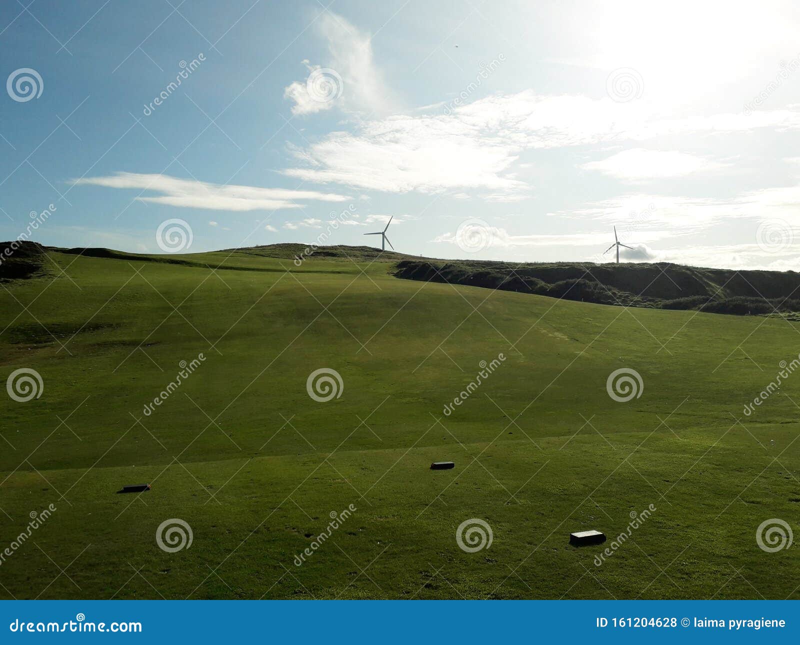 Golf Course and Wind Turbines in Front Stock Photo - Image of motion ...