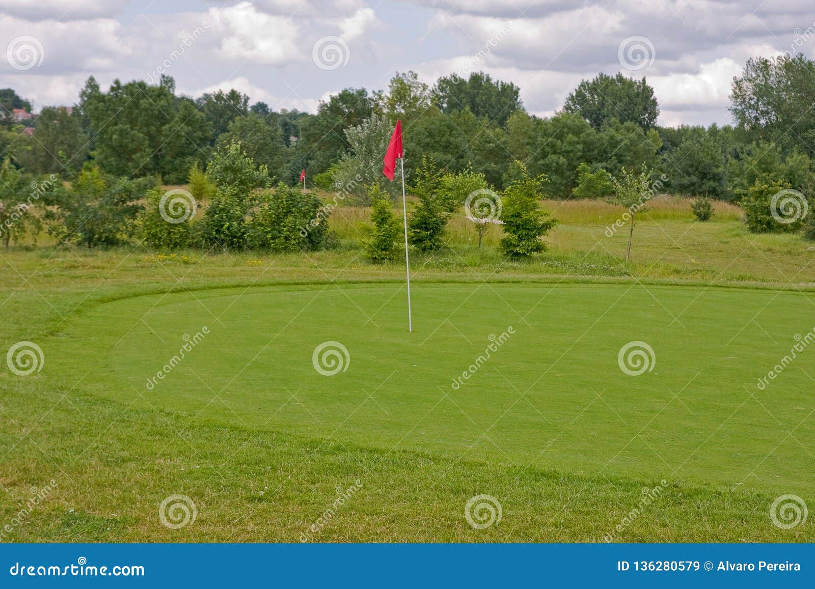 Golf field with red flag stock image. Image of hill - 136280579