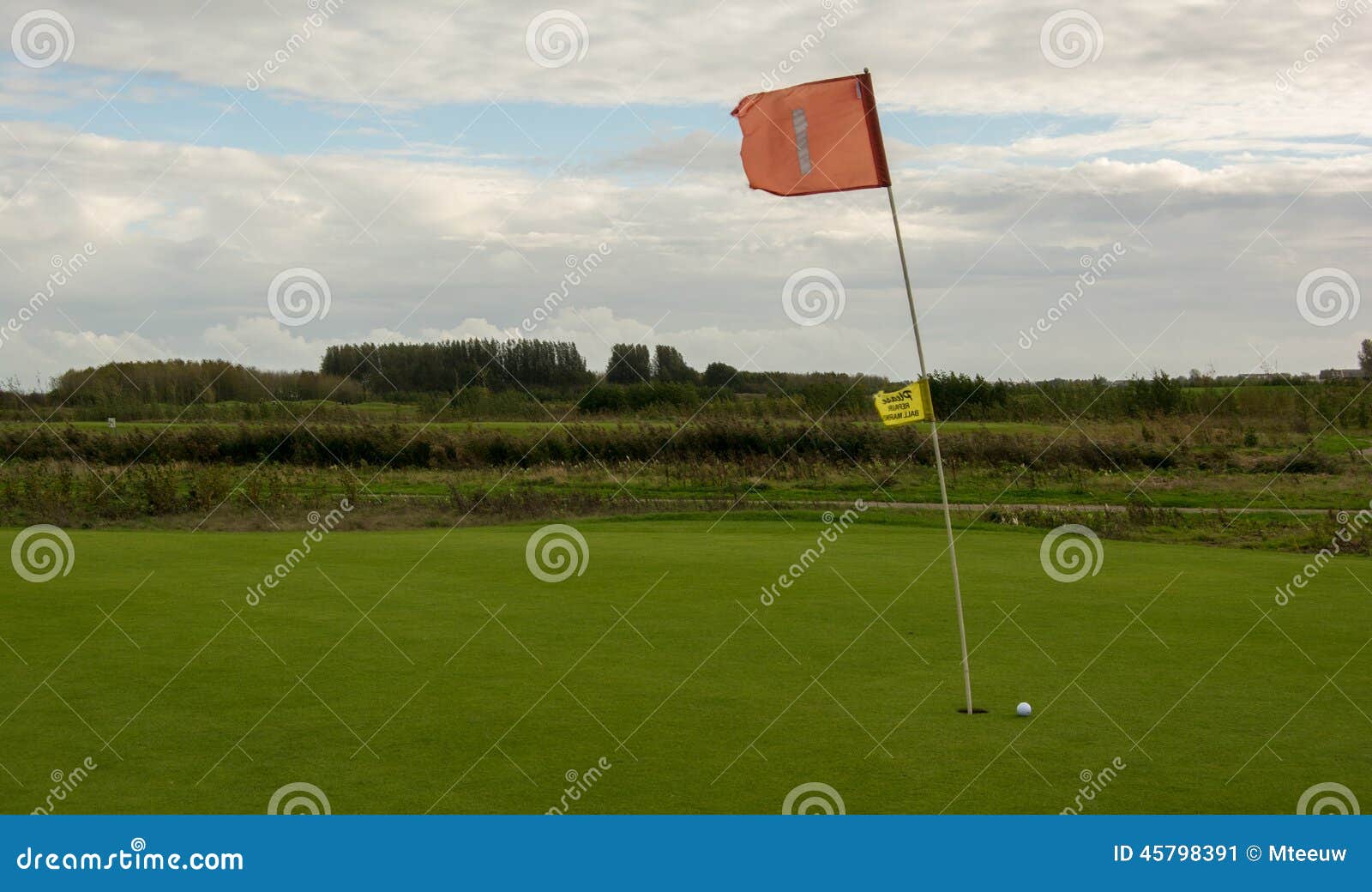 Golf flag in strong wind stock image. Image of hole, recreational ...