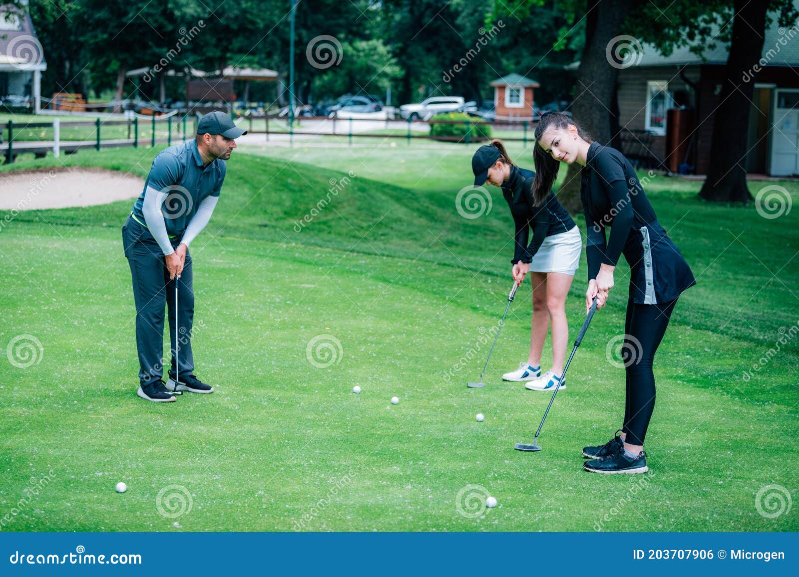 Golf Putting. Two Young Ladies Practicing Putting Stock Photo - Image ...