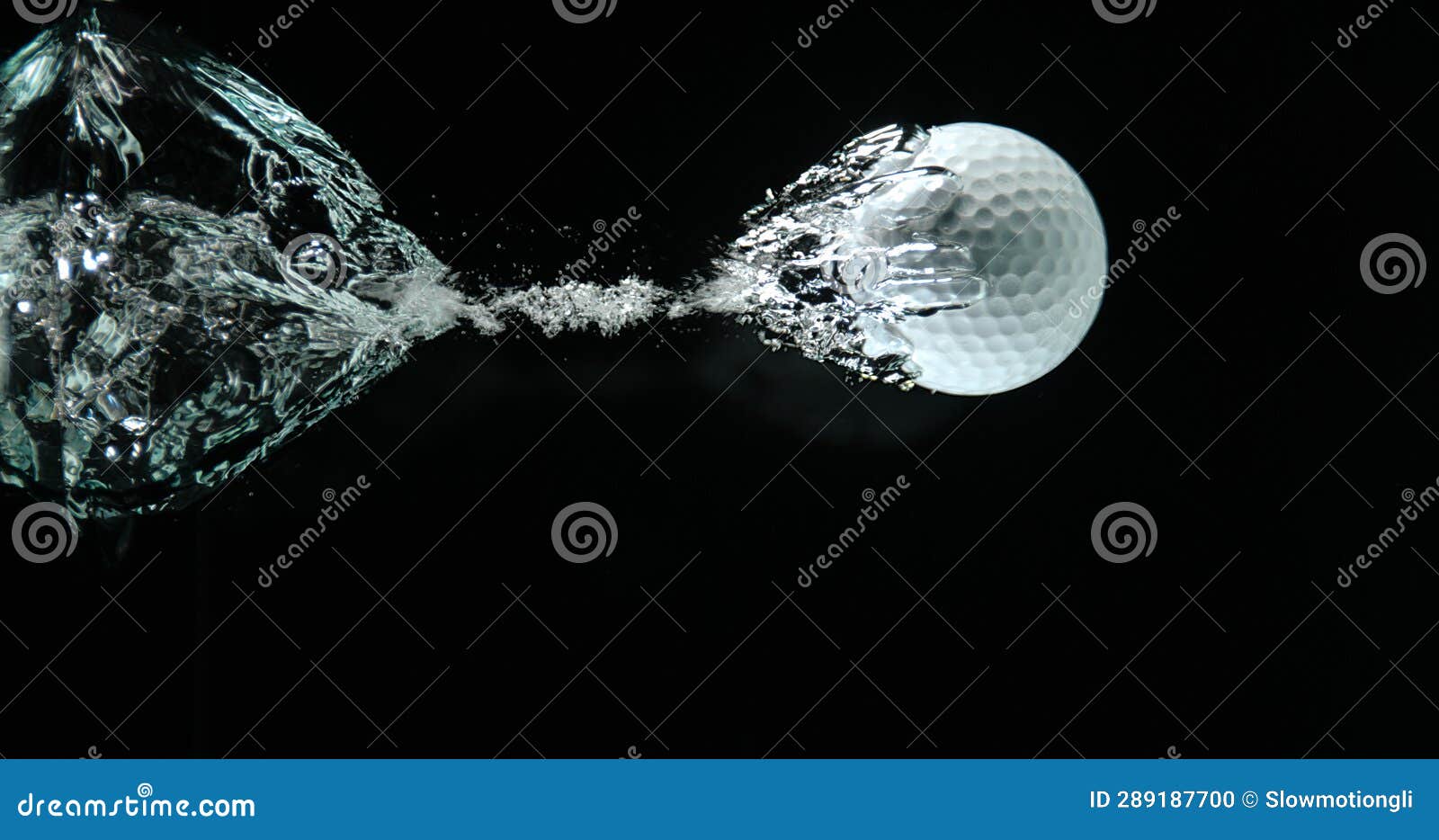 Golf S Ball Falling into Water Against Black Background Stock Photo ...