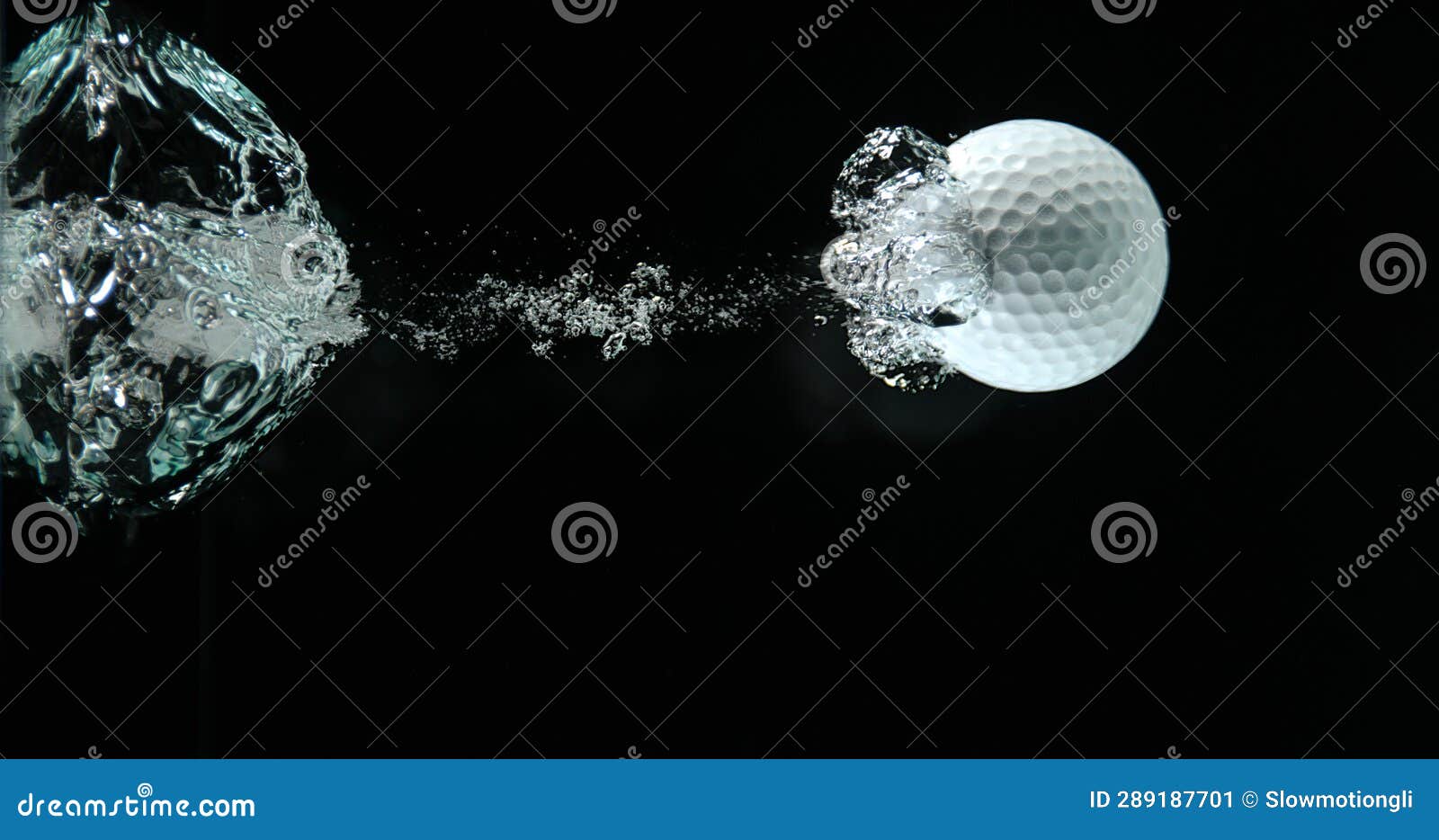 Golf S Ball Falling into Water Against Black Background Stock Image ...