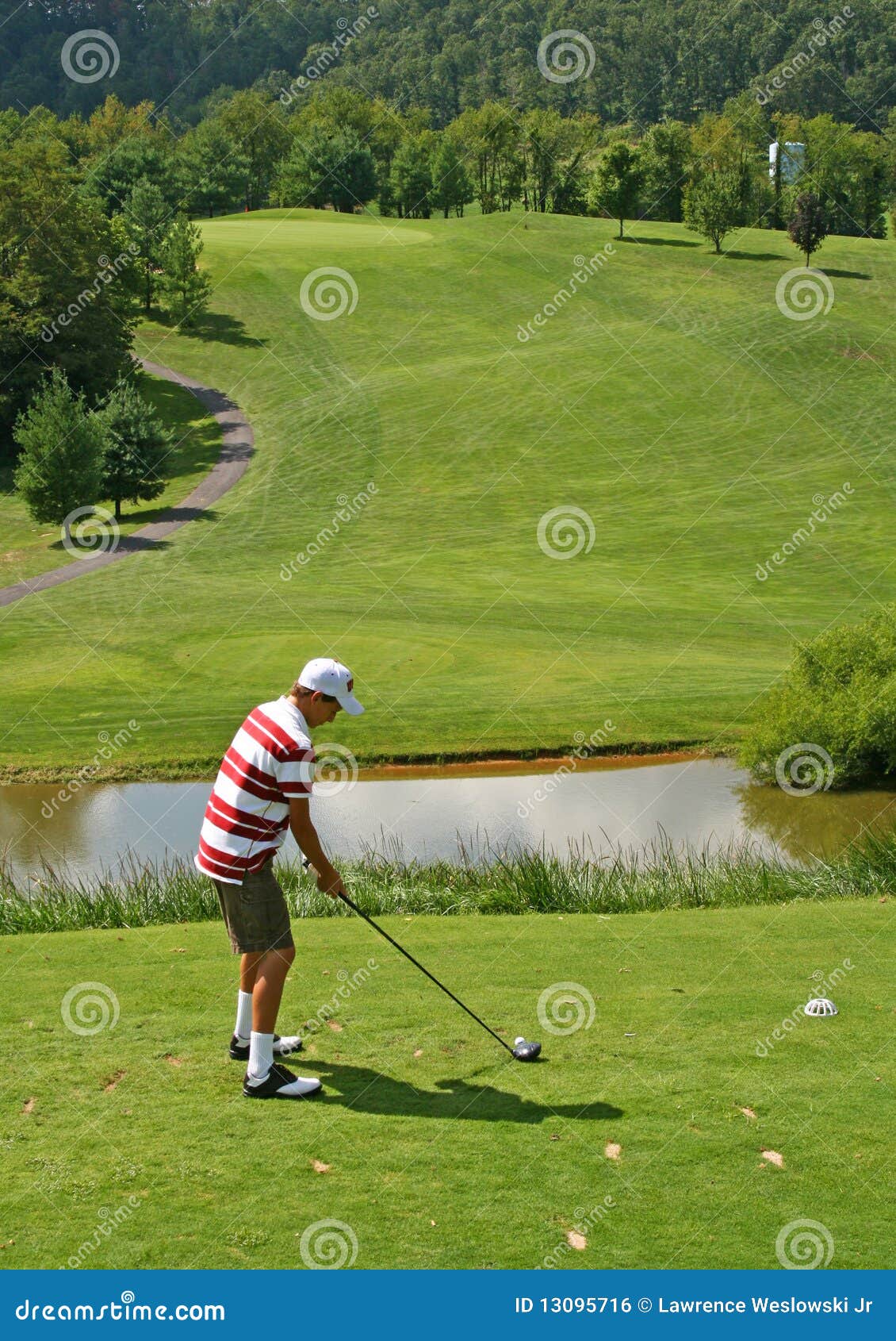 Golf - Teenager Teeing Off stock photo. Image of golf - 13095716