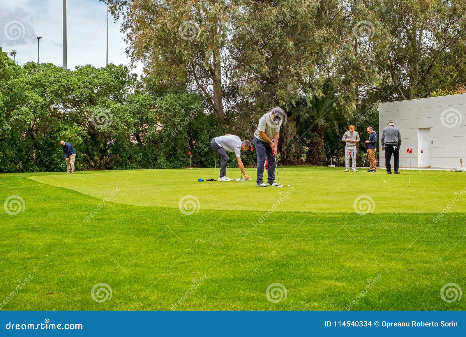 Golf Trainer Working with Golf Player on Driving Range Editorial Stock ...