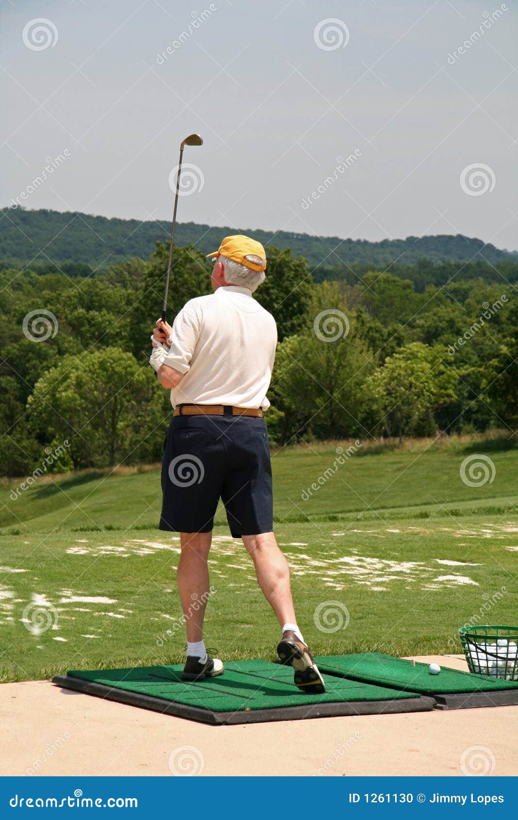 Golfer at Driving Range stock photo. Image of leisure - 1261130