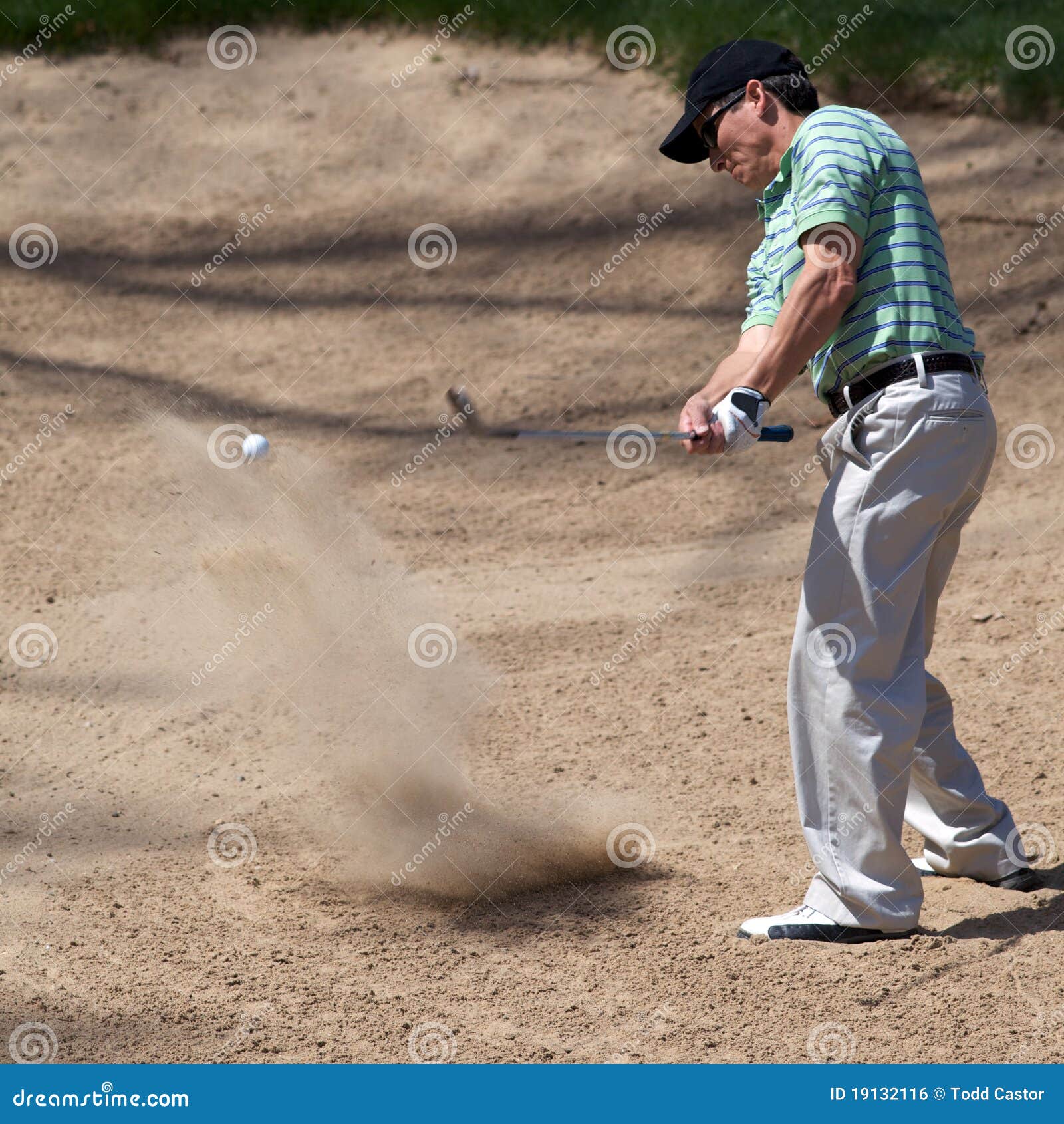 Golfer Hits His Golf Ball stock photo. Image of sand - 19132116