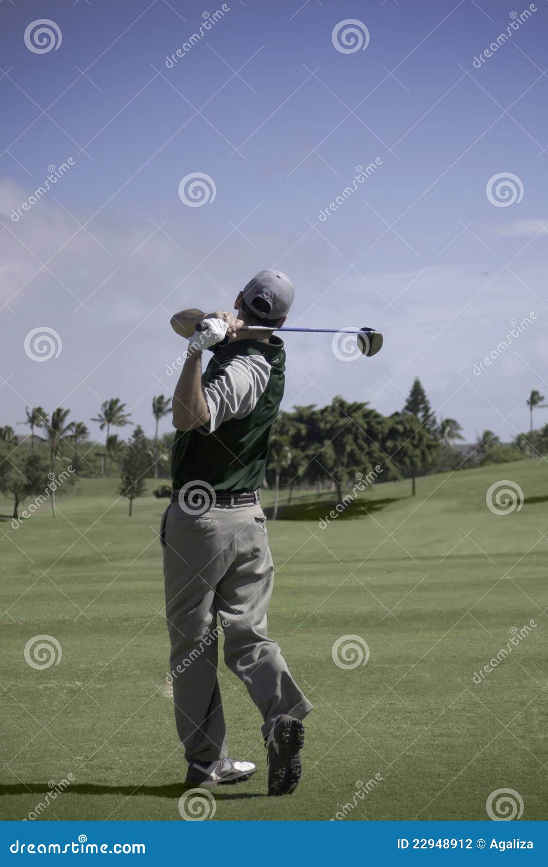 Golfer Holds His Backwing after Drive To Fairway Stock Photo - Image of ...