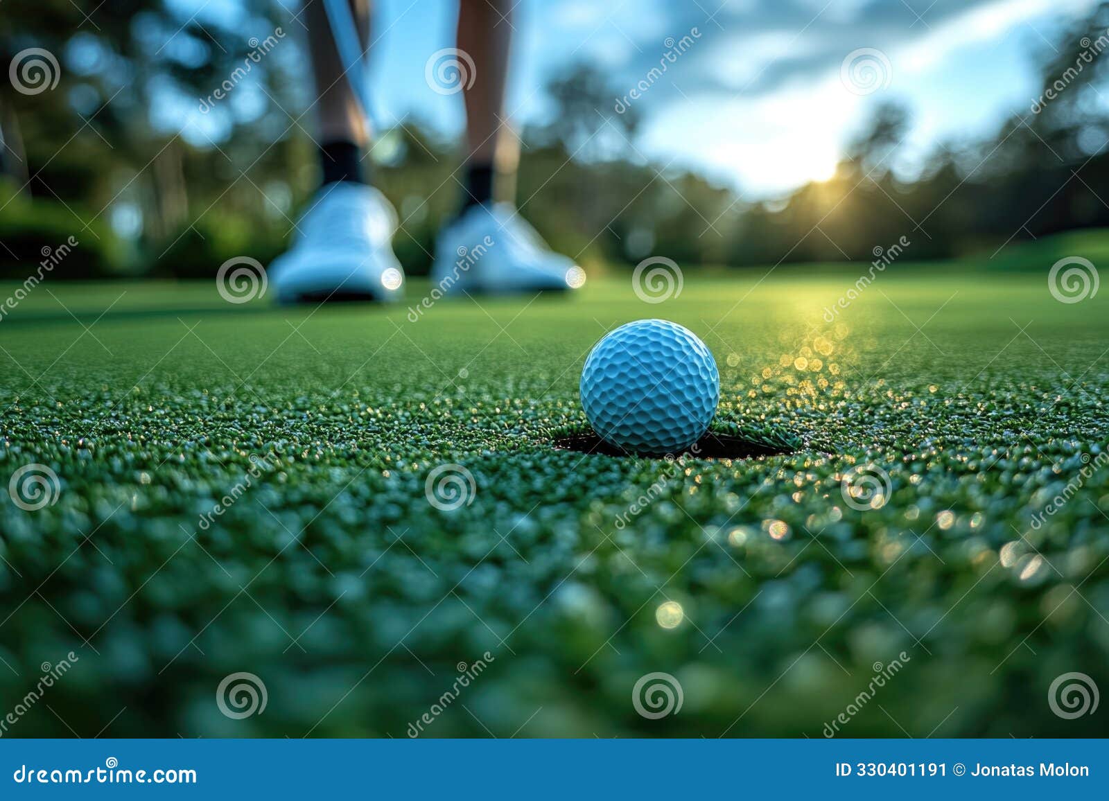 Golfer Perfecting Putting Technique: Aiming the Golf Ball at the Hole ...
