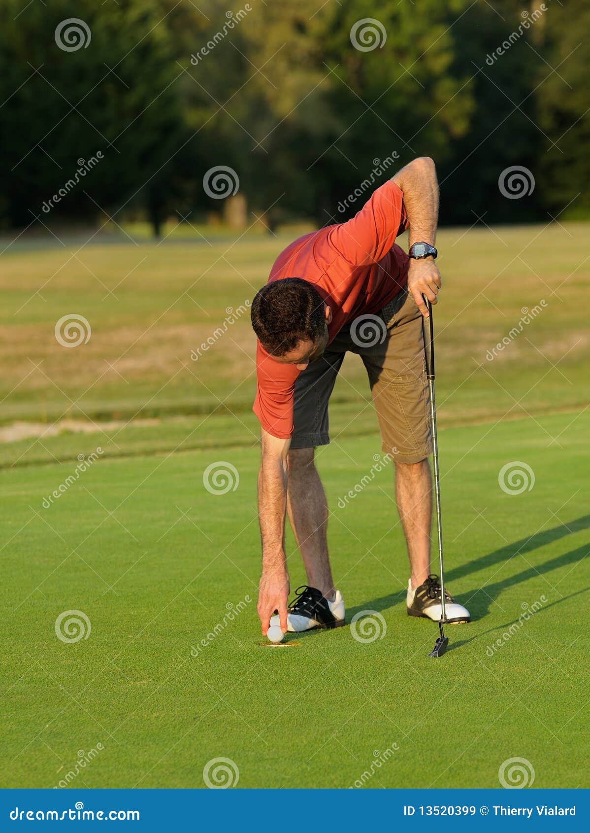 Golfer picking stock image. Image of person, competition - 13520399