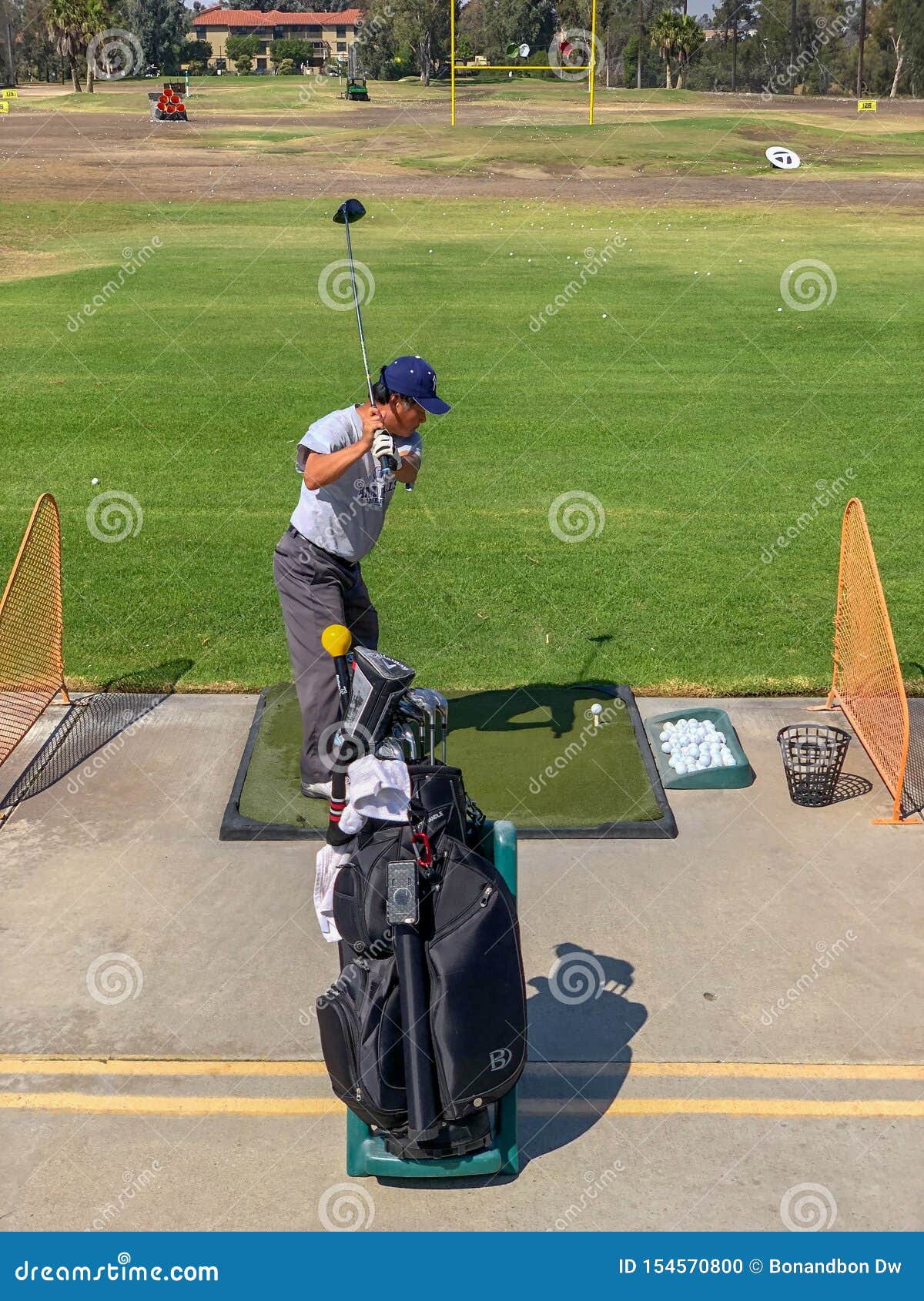 Golfer Practicing at Golf Driving Range Practice Facilit Editorial ...