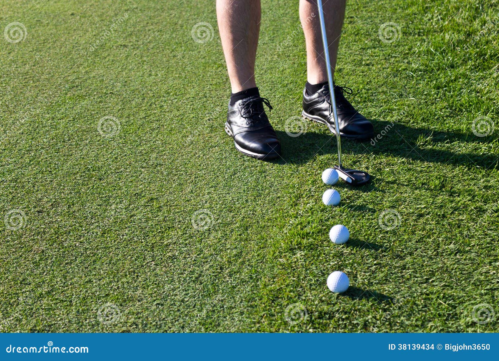 Golfer Putting the Golf Ball Stock Photo - Image of golfing, people ...