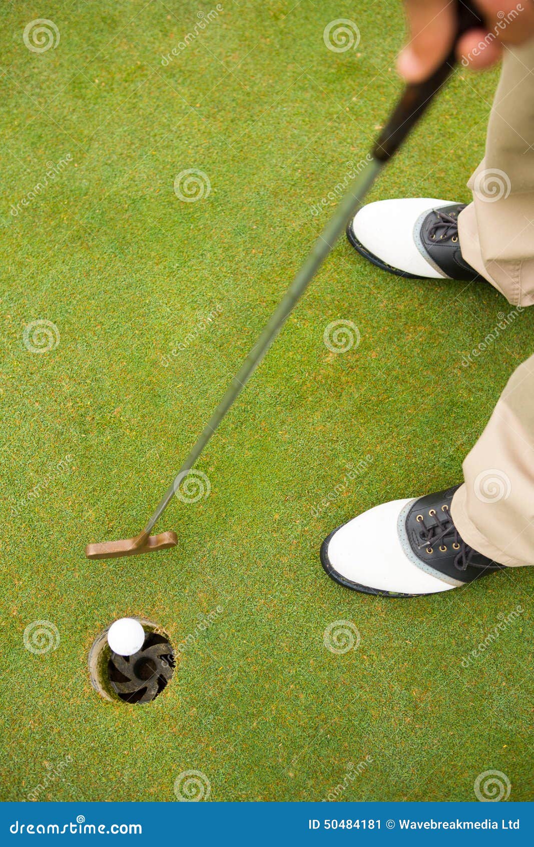 Golfer Putting Golf Ball in the Hole Stock Image - Image of player ...
