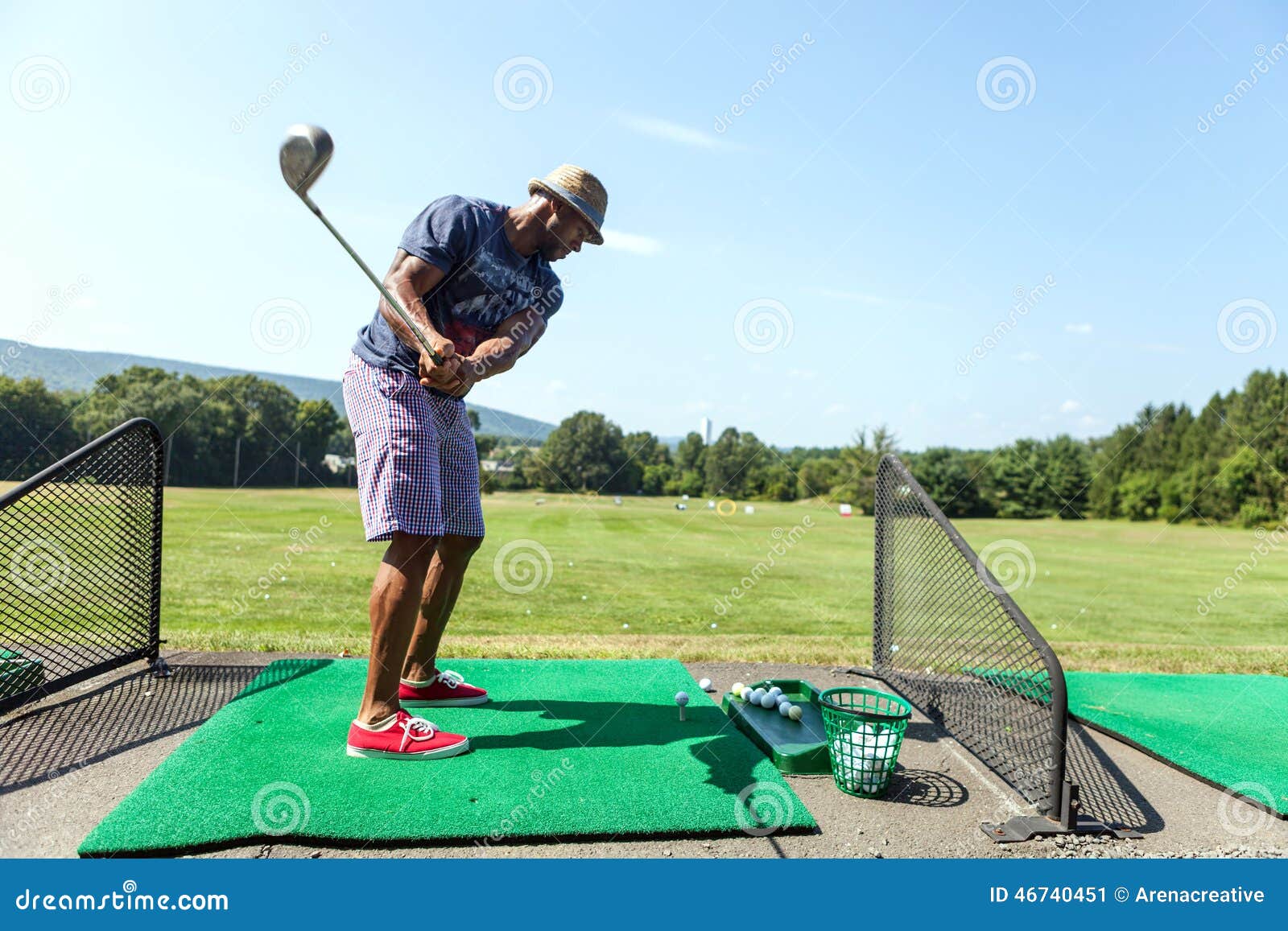Golfer at the Range stock image. Image of recreational - 46740451