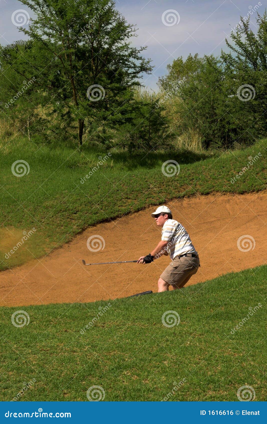 Golfer in the sand bunker. stock photo. Image of pants - 1616616
